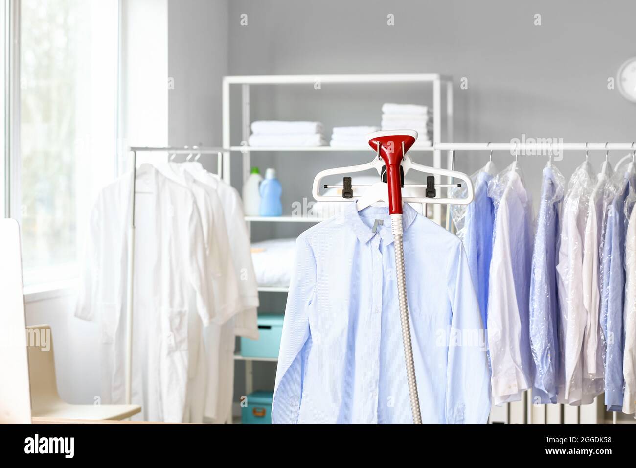 Interior modern dry cleaners hi-res stock photography and images - Alamy
