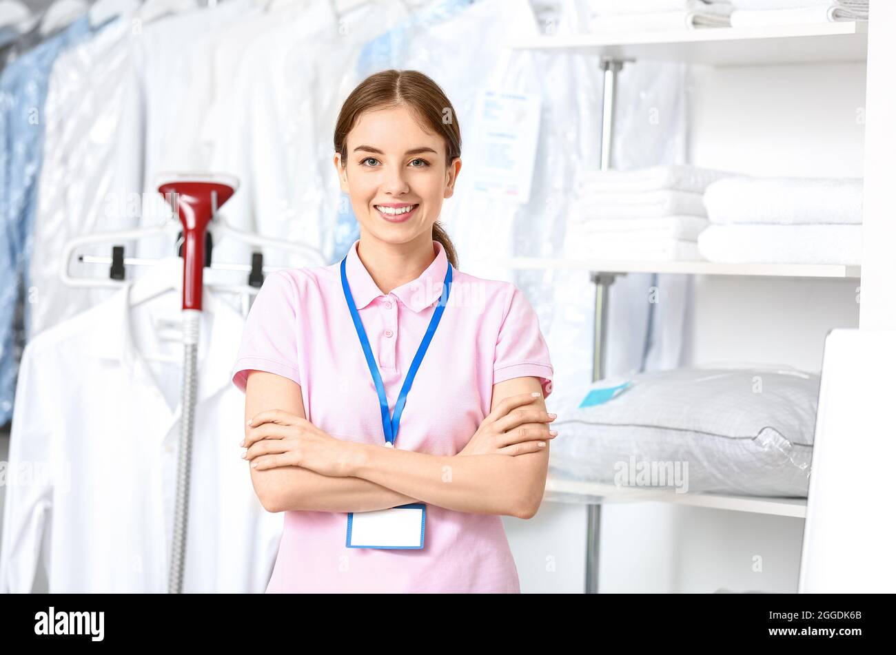 Female worker at modern dry-cleaner's Stock Photo - Alamy