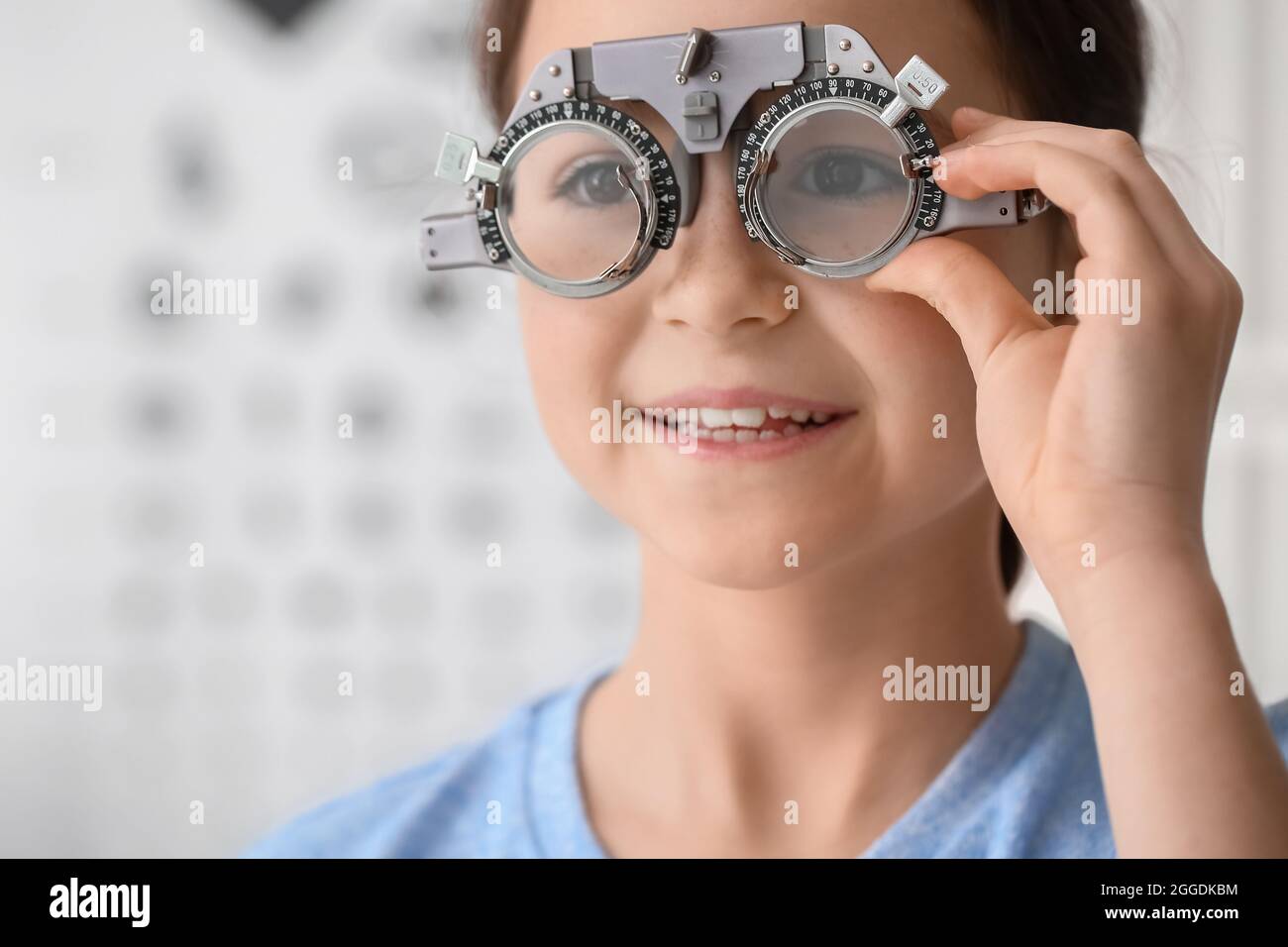Little girl undergoing eye test in clinic Stock Photo - Alamy