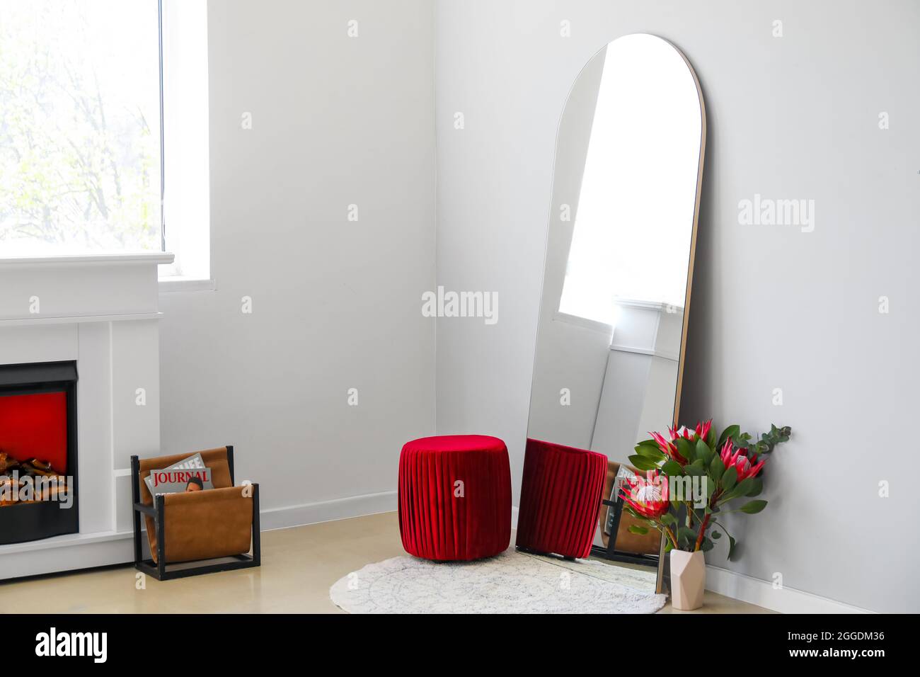 Stylish interior of modern room with mirror Stock Photo - Alamy