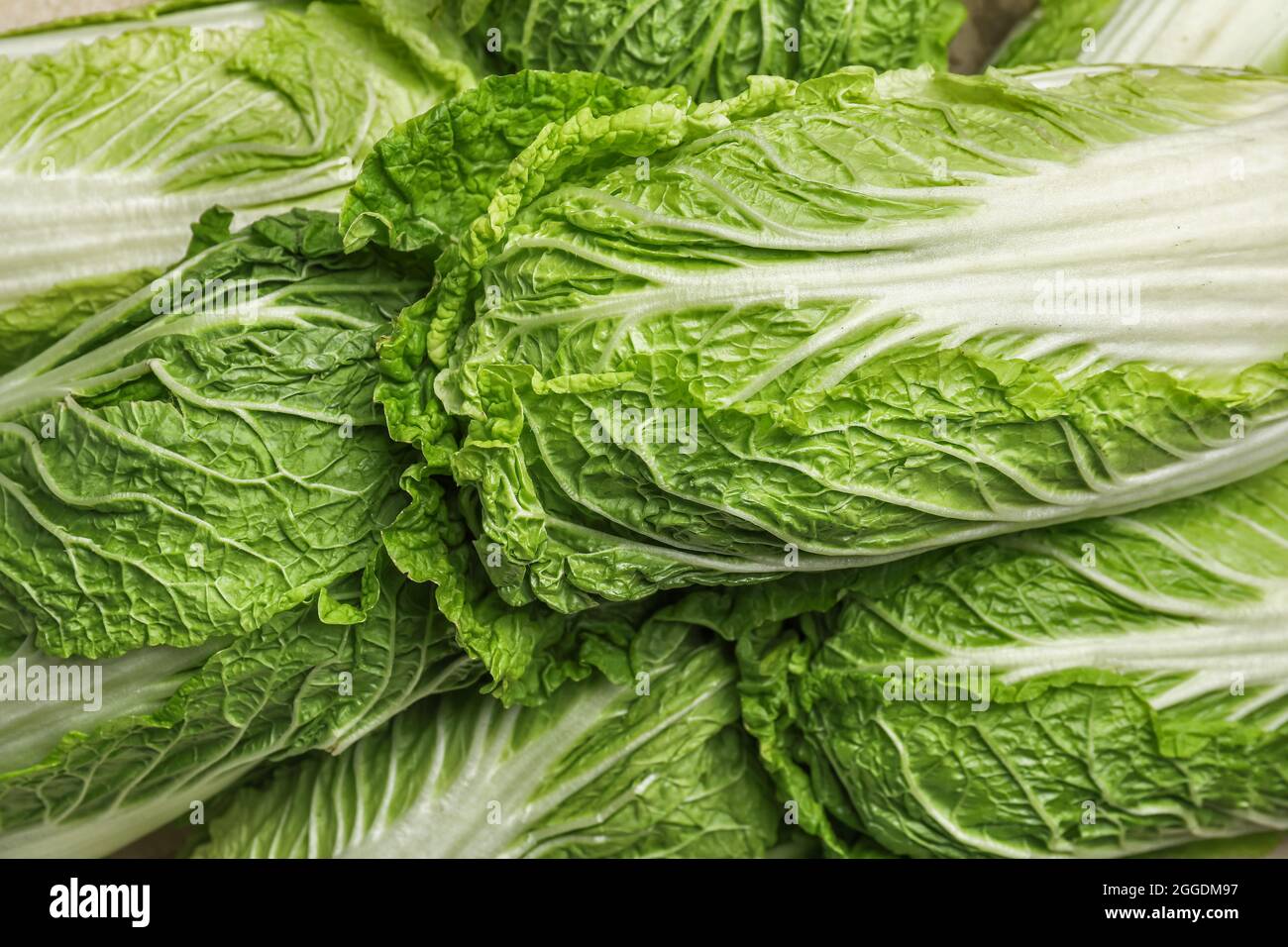 Fresh chinese cabbage as background, closeup Stock Photo - Alamy