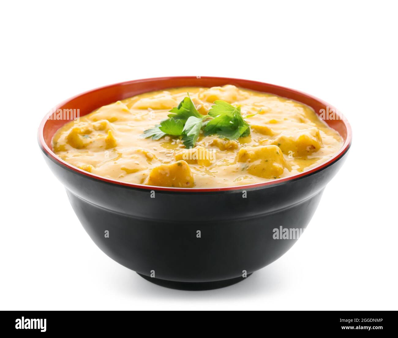 Bowl of tasty chicken curry on white background Stock Photo - Alamy