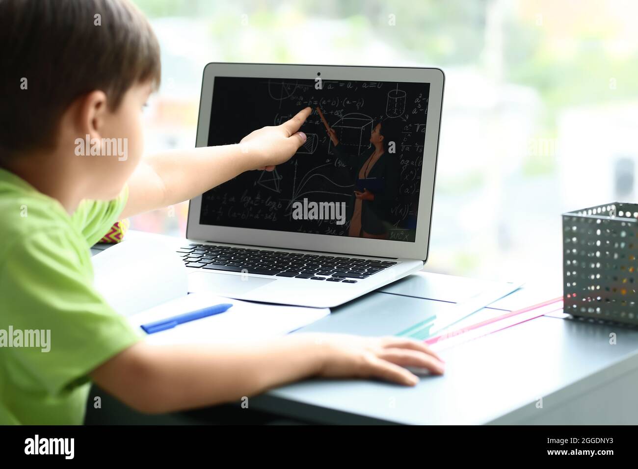 Little boy studying Math online at home Stock Photo - Alamy