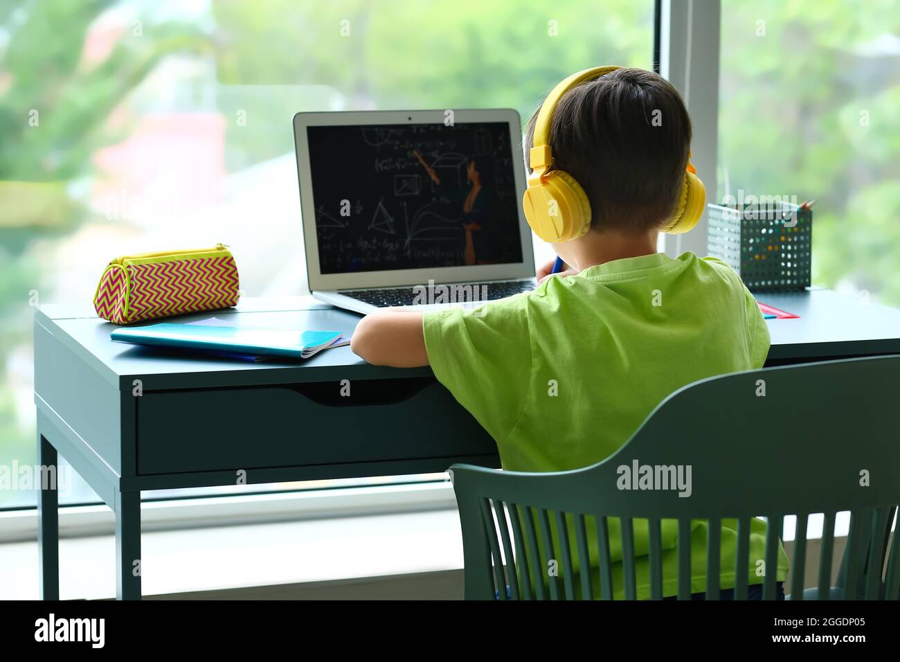 Little boy studying Math online at home Stock Photo - Alamy