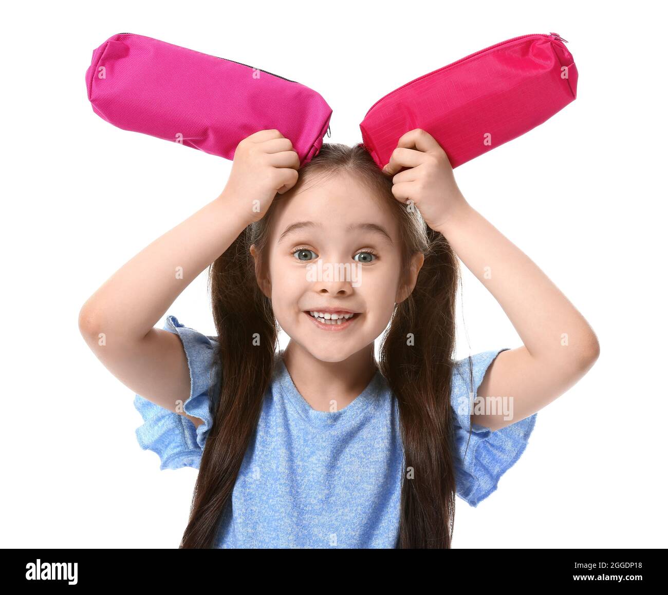 Little girl with pencil cases on white background Stock Photo - Alamy