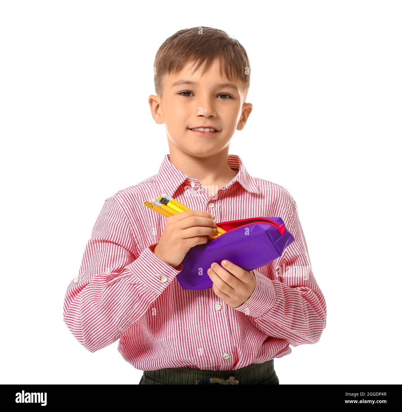 Little boy with pencils and case on white background Stock Photo - Alamy