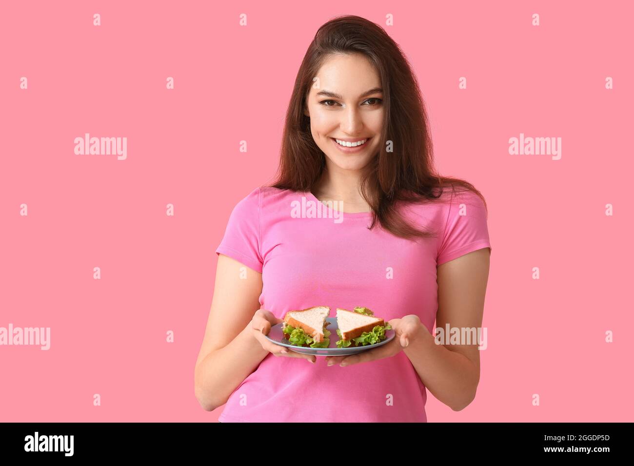 Woman eating bread triangle sandwich hi-res stock photography and ...
