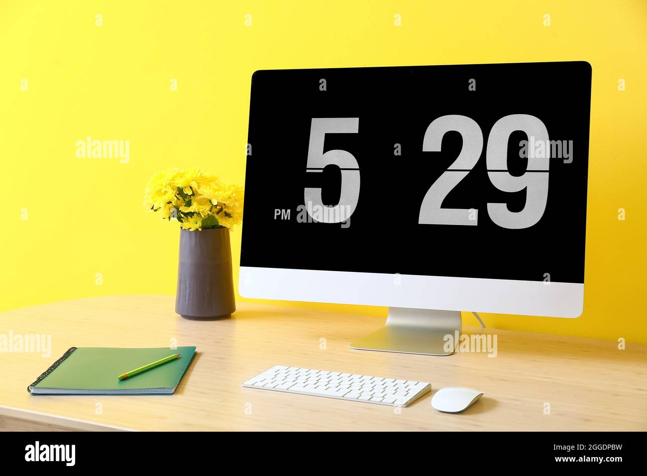 Modern workplace with computer near color wall Stock Photo - Alamy