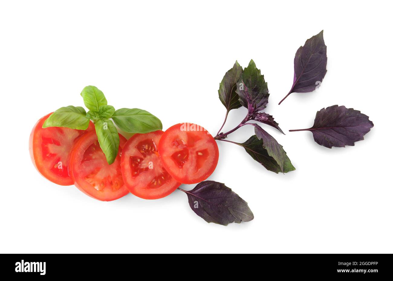 Fresh basil and tomato on white background Stock Photo - Alamy