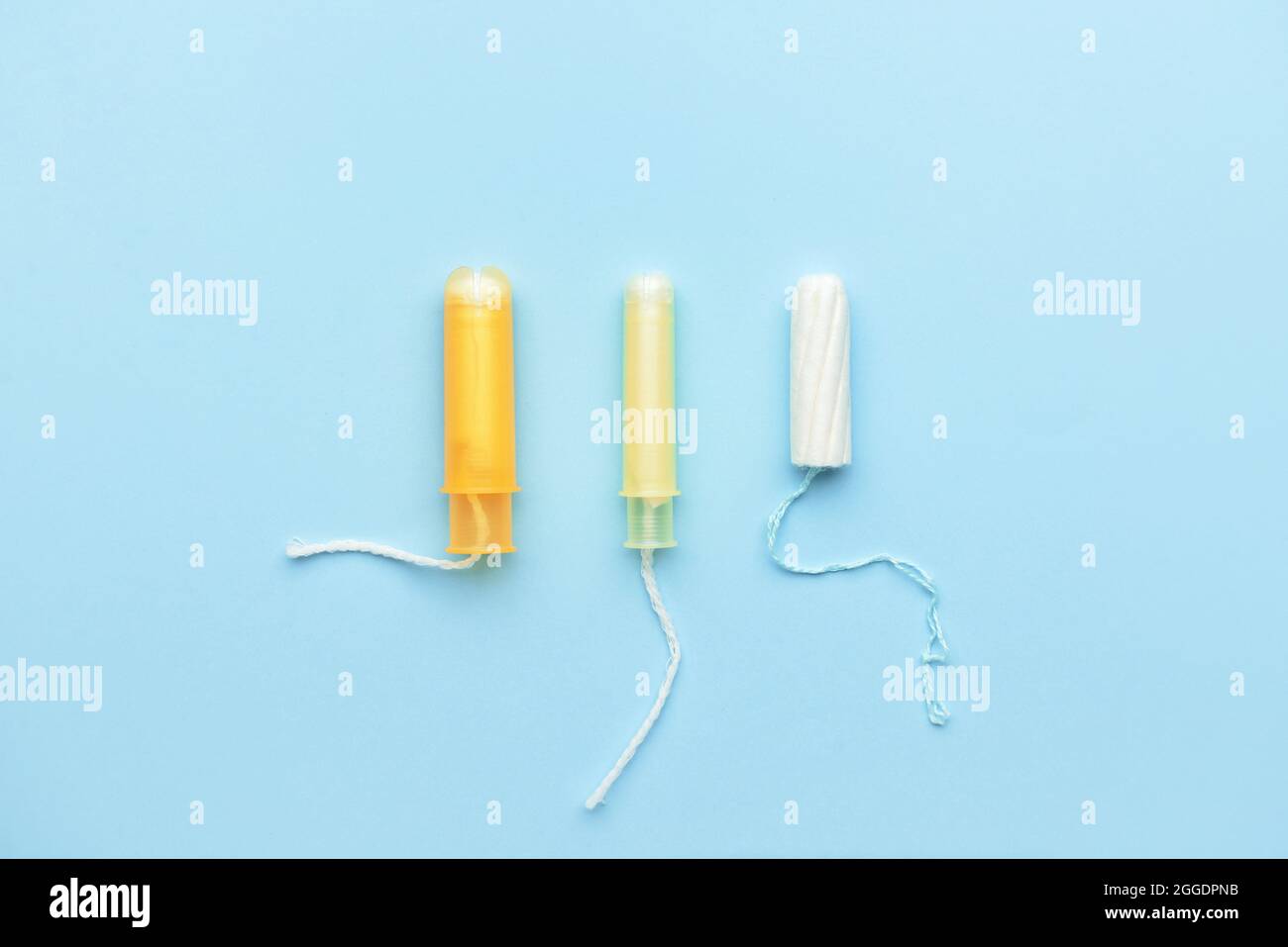 Tampons on color background, top view Stock Photo - Alamy