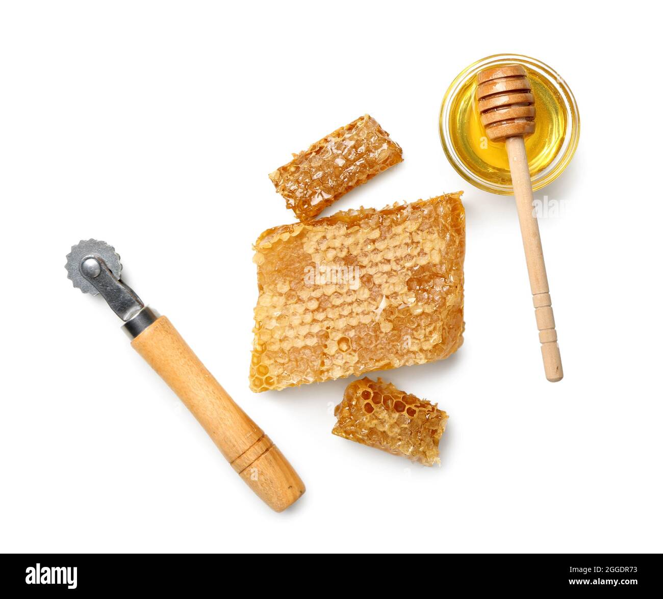 Bee knife with honey on white background Stock Photo - Alamy