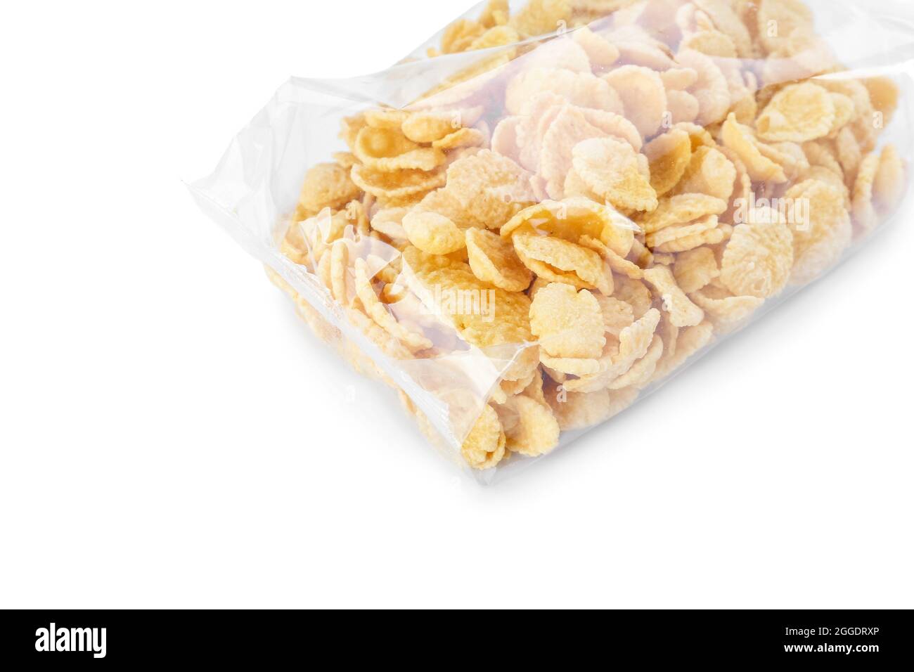 Bag with tasty corn flakes on white background, closeup Stock Photo - Alamy