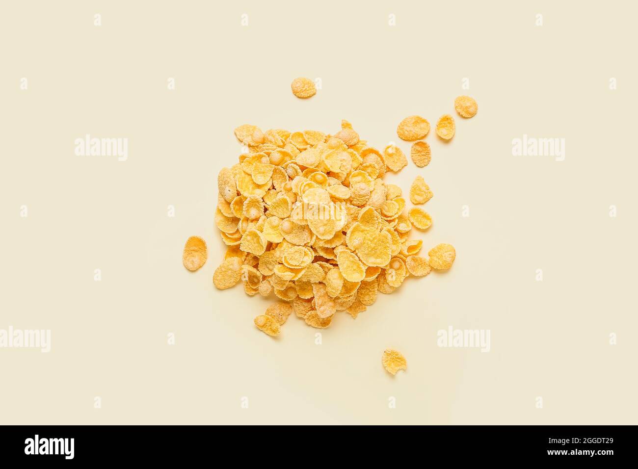 Heap of tasty cornflakes on color background Stock Photo - Alamy