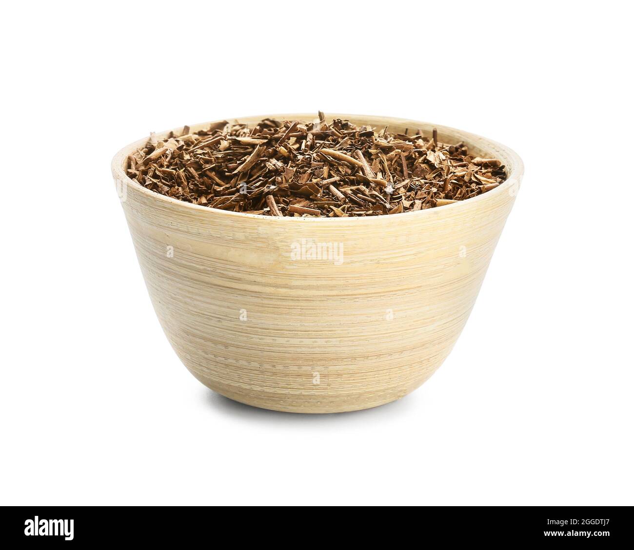 Bowl of dry hojicha green tea on white background Stock Photo - Alamy