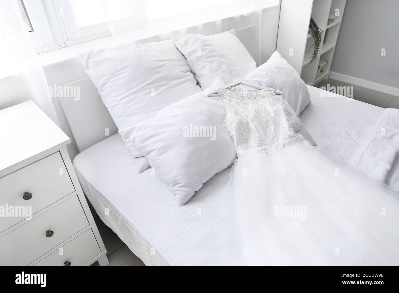 Wedding dress on bed hi-res stock photography and images - Alamy