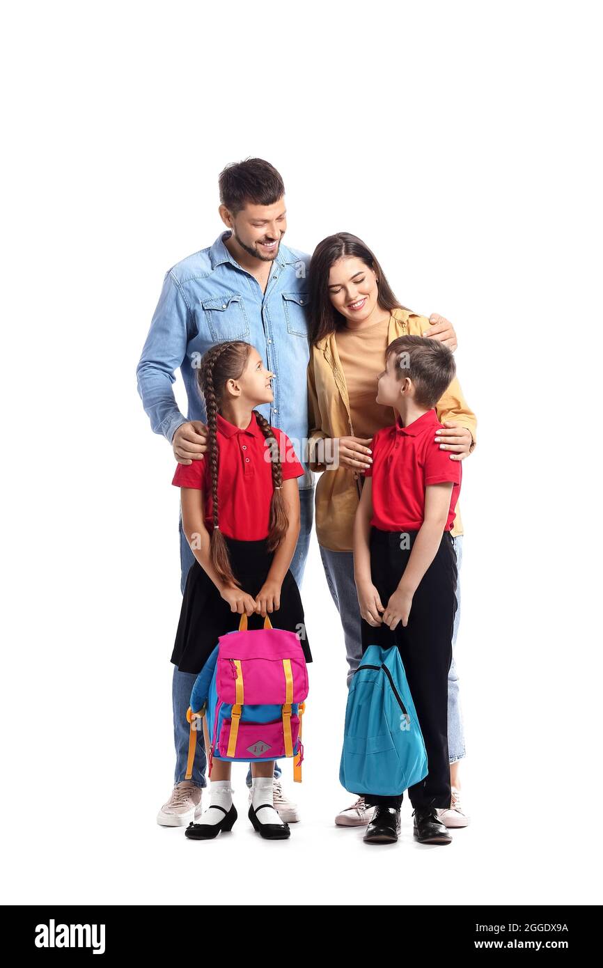 Little schoolchildren with their parents on white background Stock ...