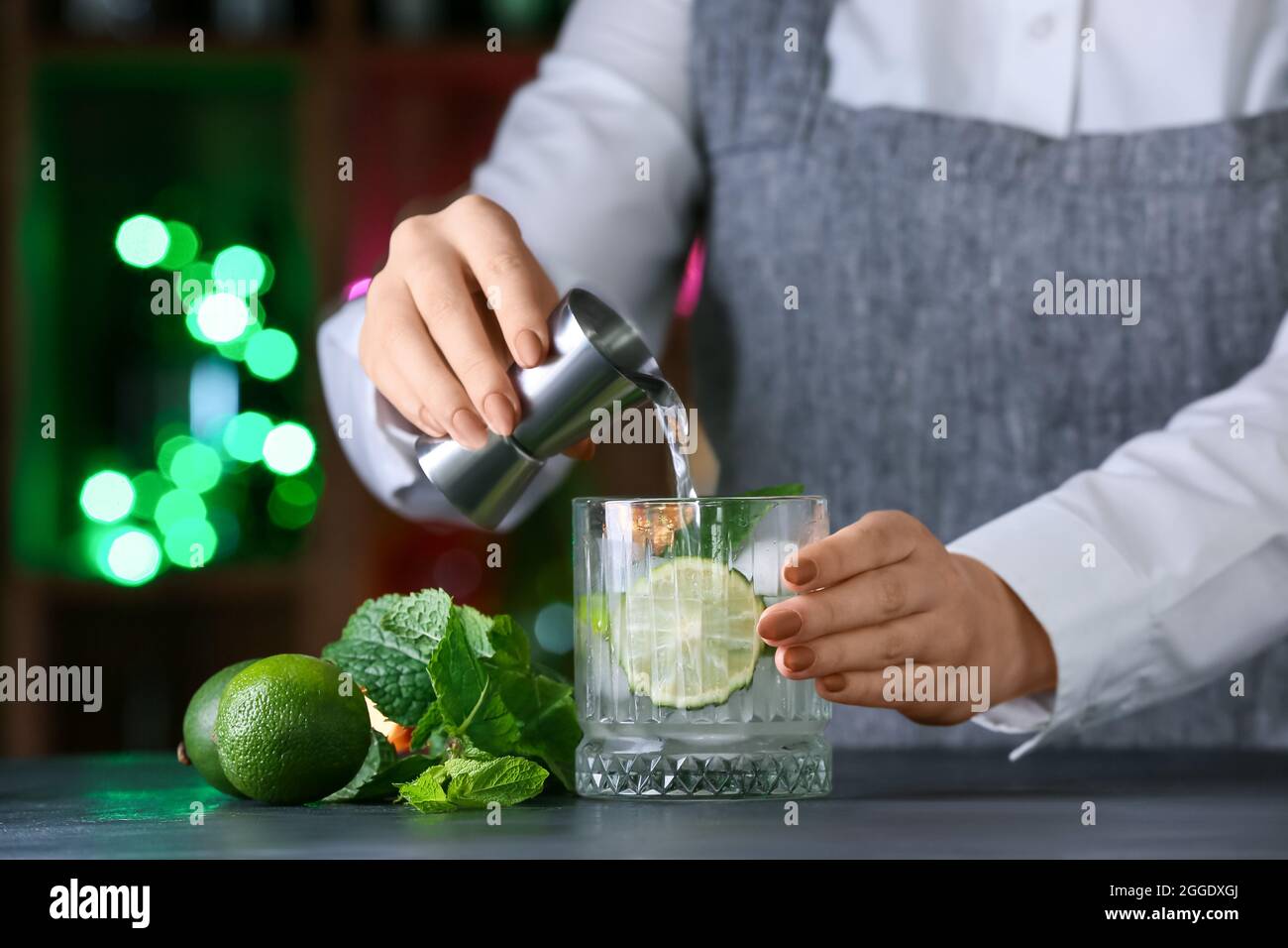 Pouring fresh mojito in glass hi-res stock photography and images - Alamy