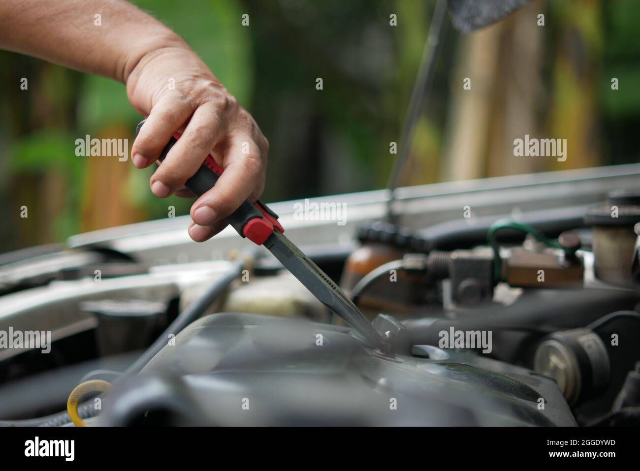 working and repair on car engine Stock Photo - Alamy