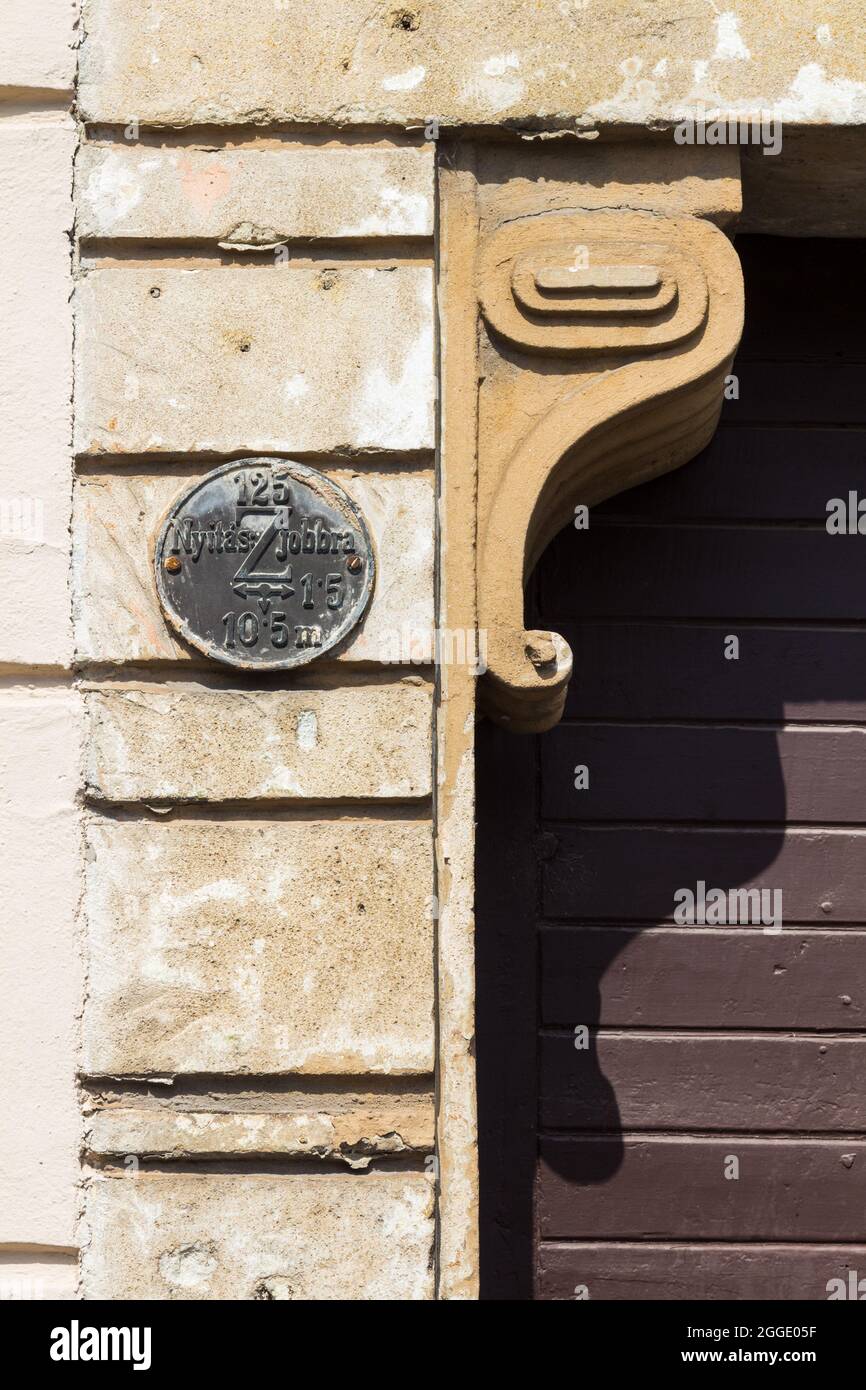Old metal water tap sign board on street level, Sopron, Hungary Stock ...