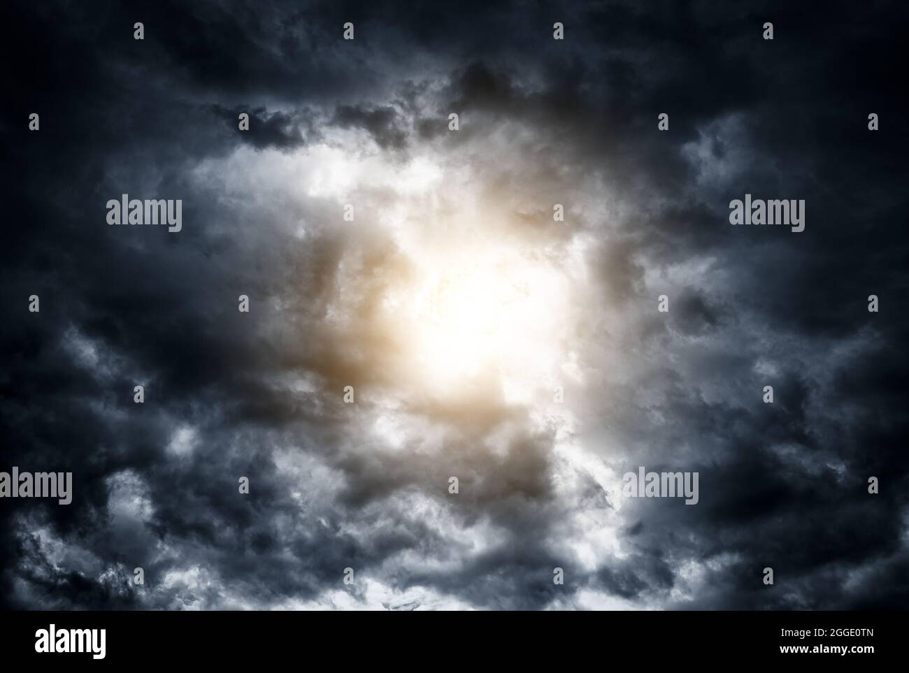 Light in the Dark and Dramatic Storm Clouds Stock Photo - Alamy
