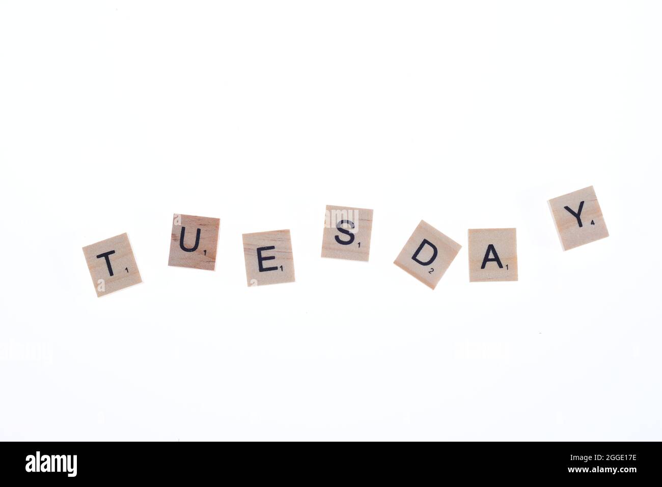 Word tuesday arranged from wooden blocks on white background Stock ...