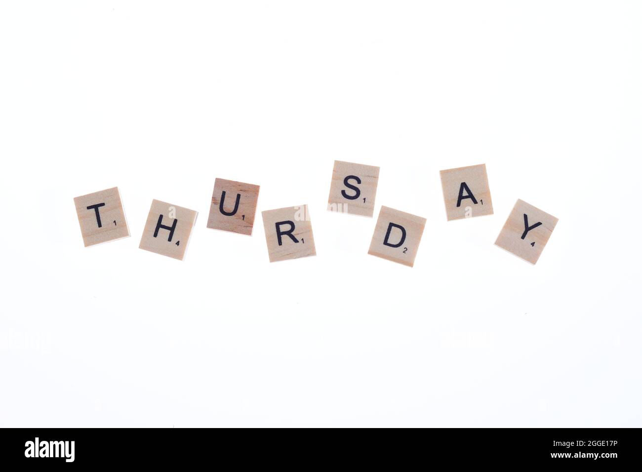 Word thursday arranged from wooden blocks on white background Stock ...