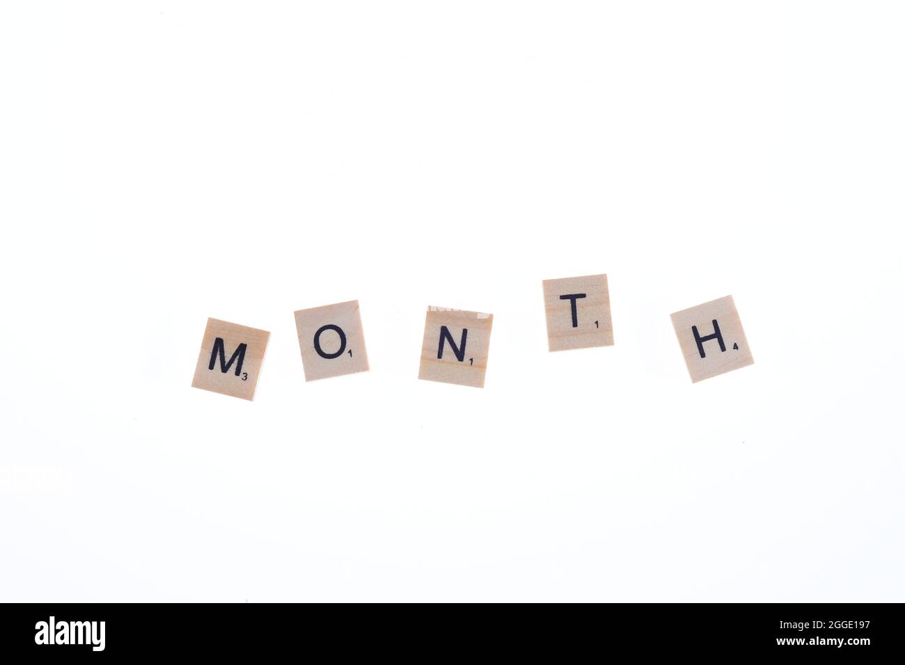 Word month arranged from wooden blocks on white background Stock Photo ...