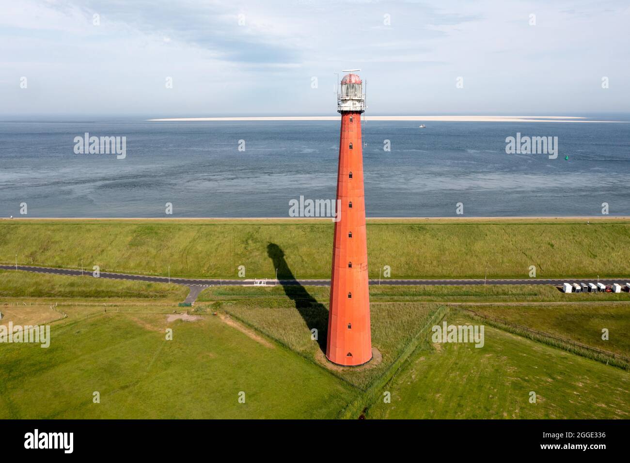 Drone shot of the lighthouse Huisduinen, called the long Jaap with the ...