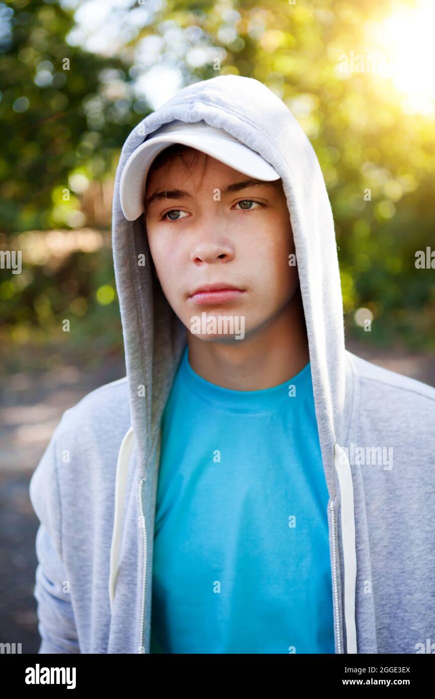 Sad Teenager Portrait in the Summer Park Stock Photo - Alamy
