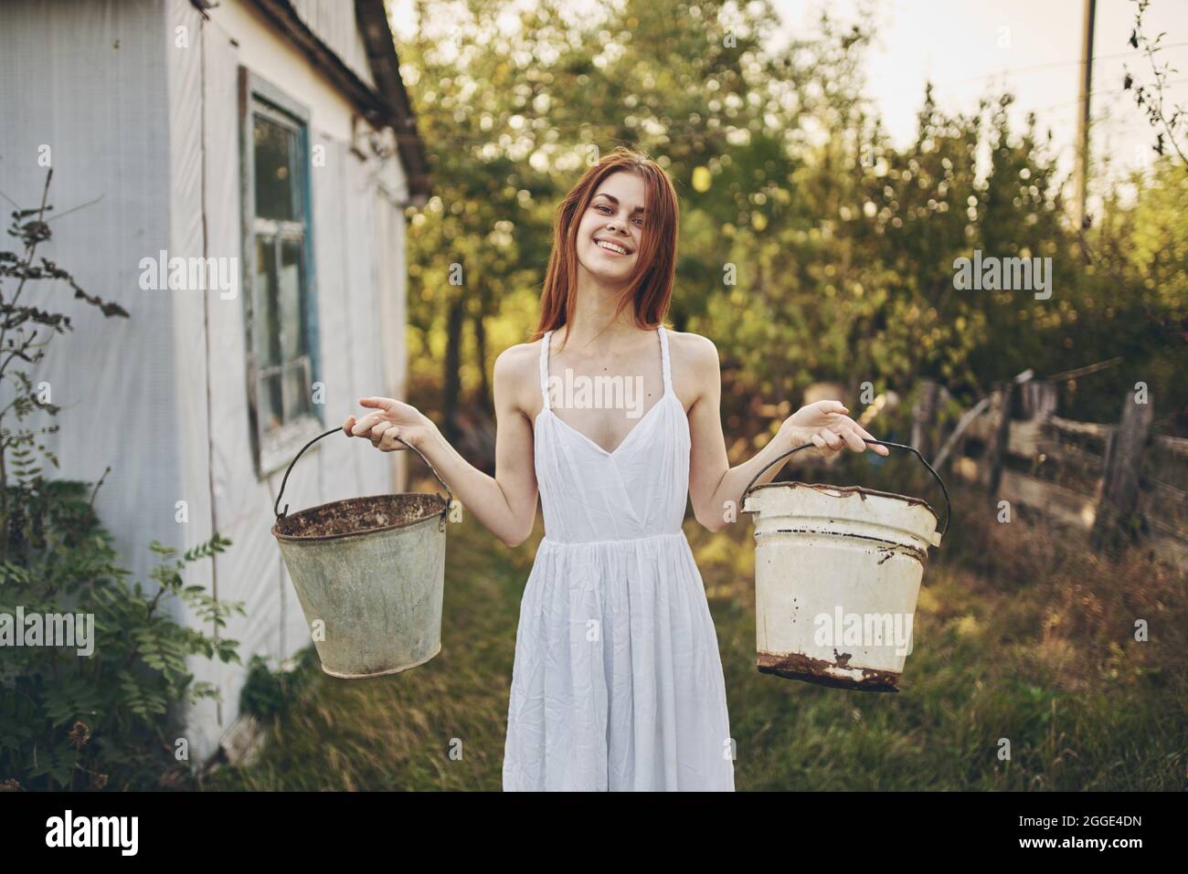 pretty woman work in the village nature Lifestyle Stock Photo - Alamy