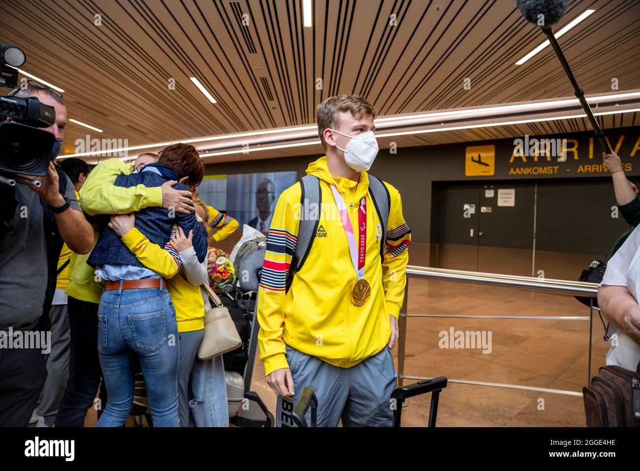 Belgian table tennis player Laurens Devos and his medal pictured at the ...