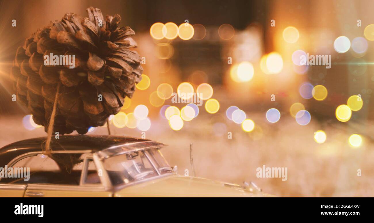 Image of pine cone on car model with glowing lights Stock Photo - Alamy