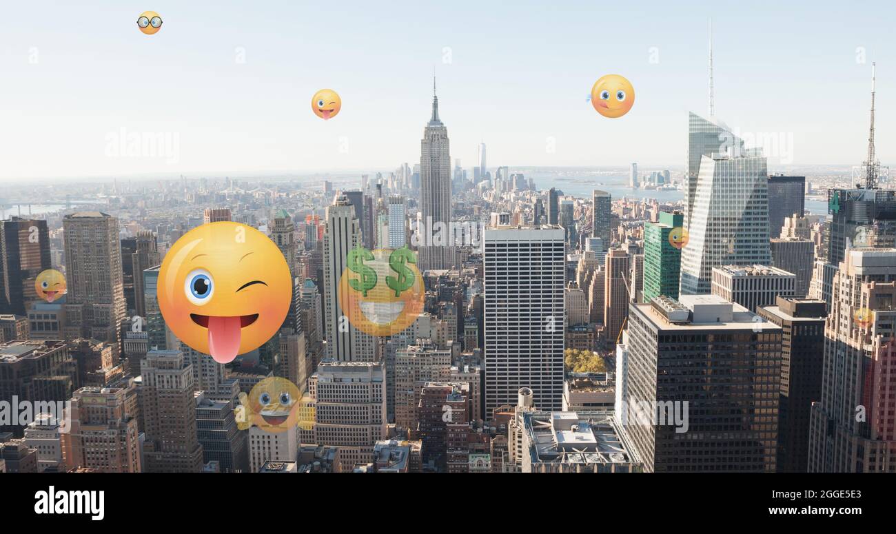 Image of emoji icons flying up over cityscape Stock Photo - Alamy