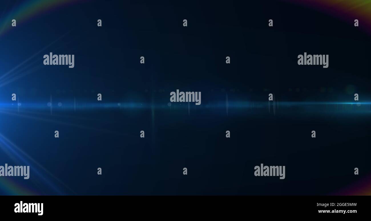 Spot of light and lens flare against black background Stock Photo - Alamy