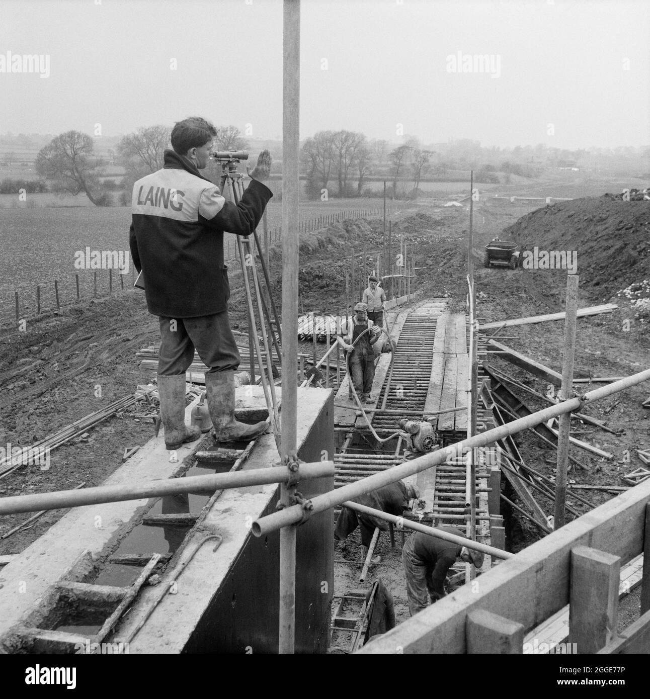 Surveyor surveying Black and White Stock Photos & Images - Alamy