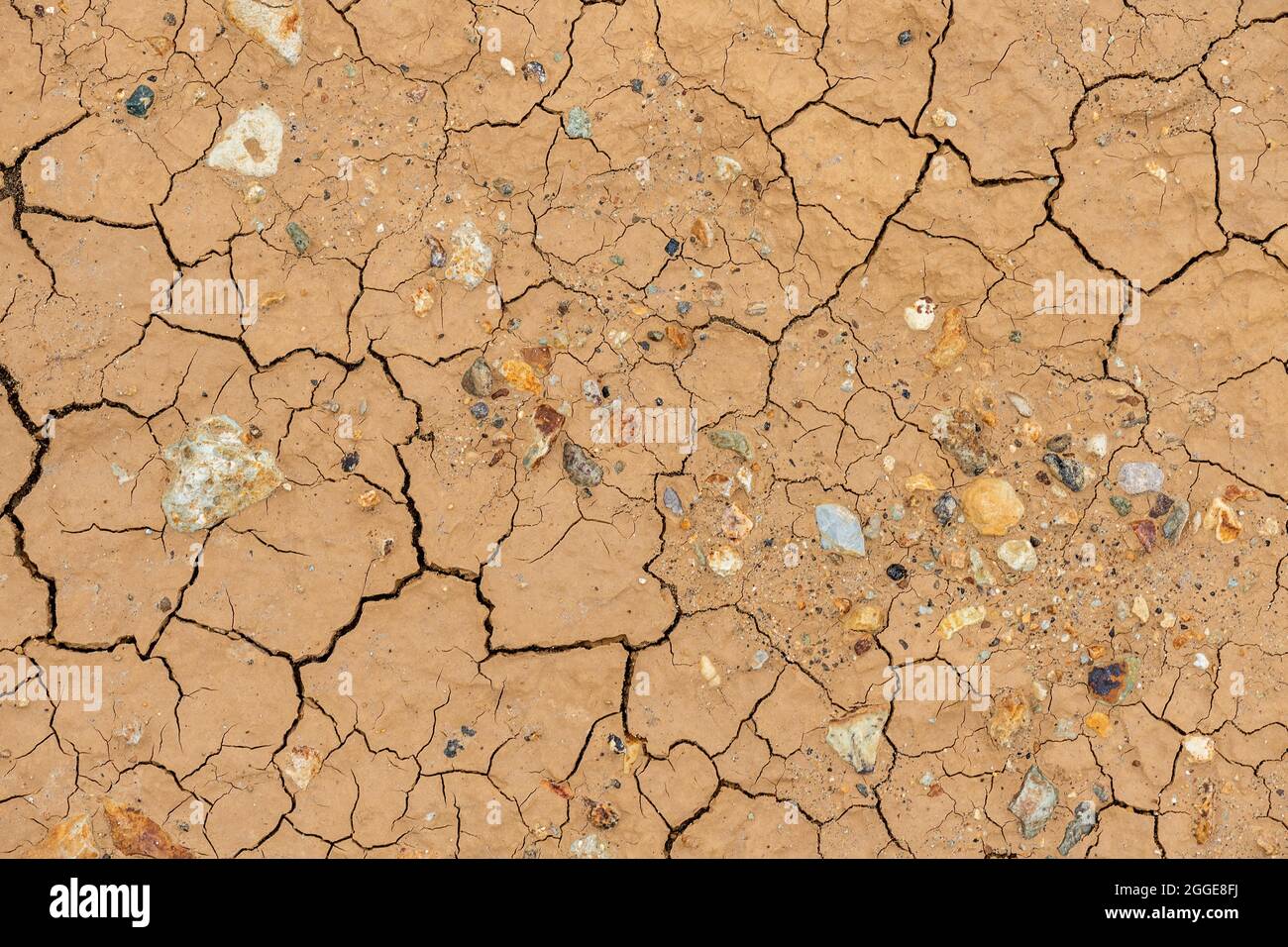 Cracks in the clay soil and coloured rhyolite rock, Landmannalaugar ...