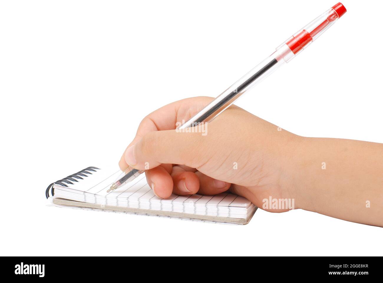 Child's hand writing on a notebook isolated on a white background Stock ...