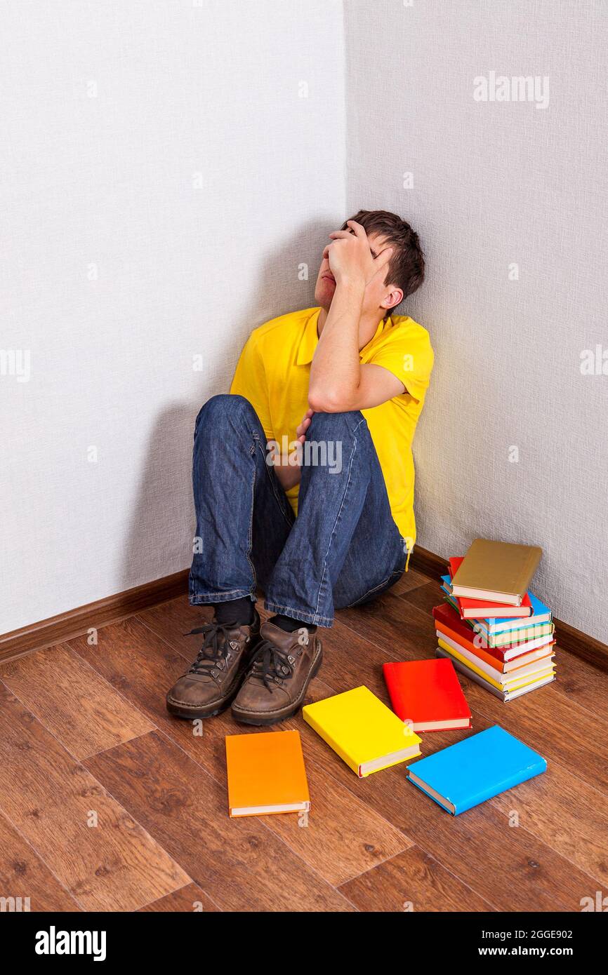Sad boy corner room hi-res stock photography and images - Alamy