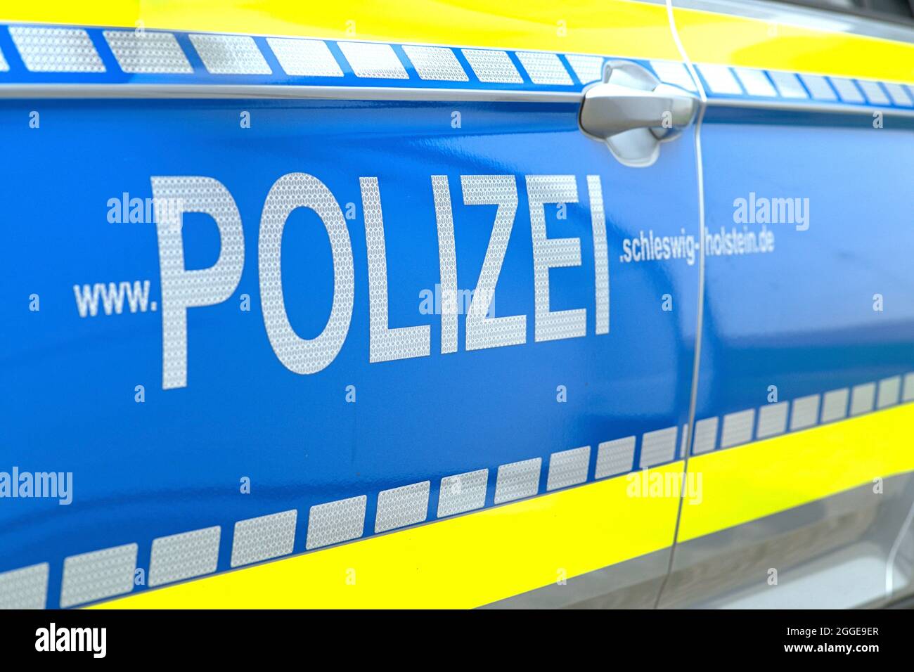 Blue and yellow police markings hi-res stock photography and images - Alamy