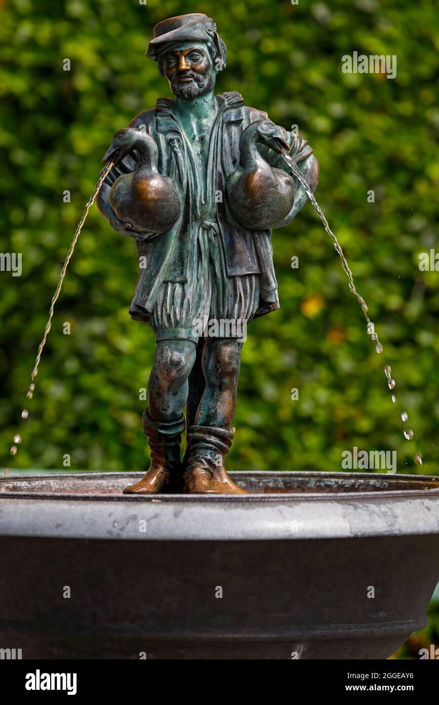 Goose-man fountain in the garden of Hohenschwangau Castle, Schwangau ...