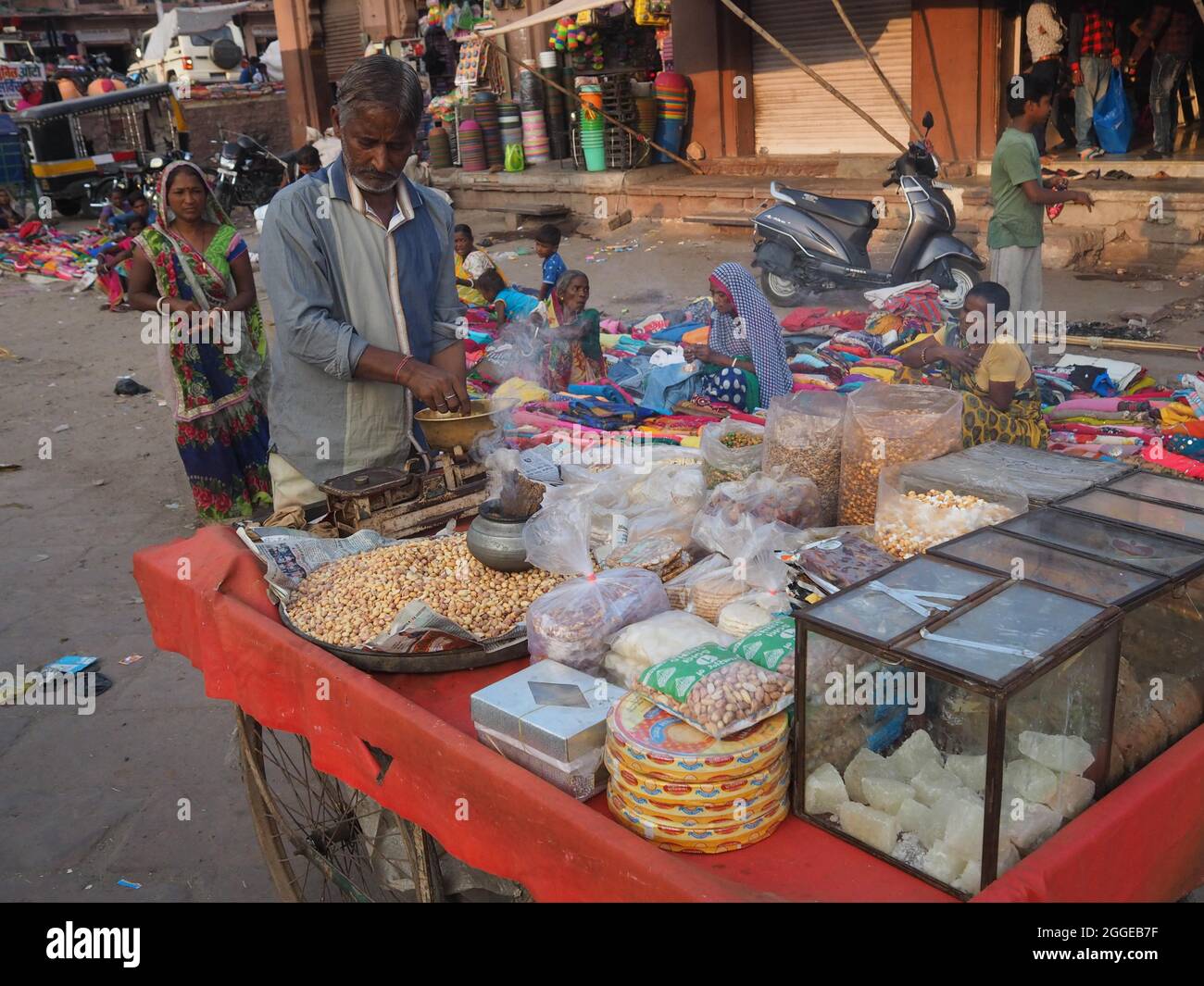 Vendor offering snacks at market stall, Jodhpur, Rajasthan, India Stock ...