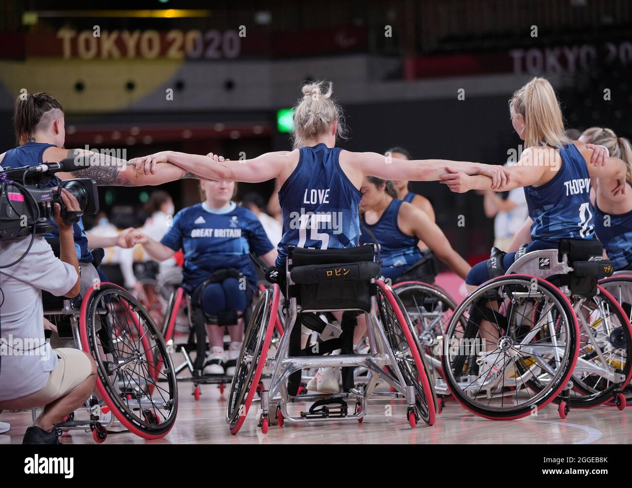 Tokyo, Japan. 31st Aug, 2021. Robyn Love (C) of Britain reacts with ...