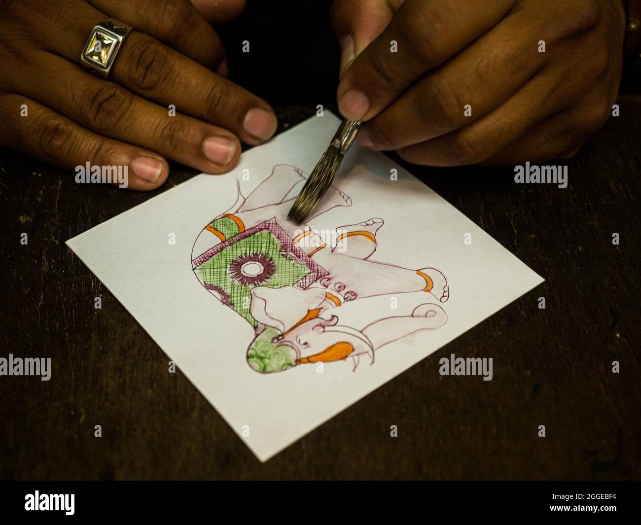 Artist creates traditional miniature painting, Udaipur, Rajasthan ...