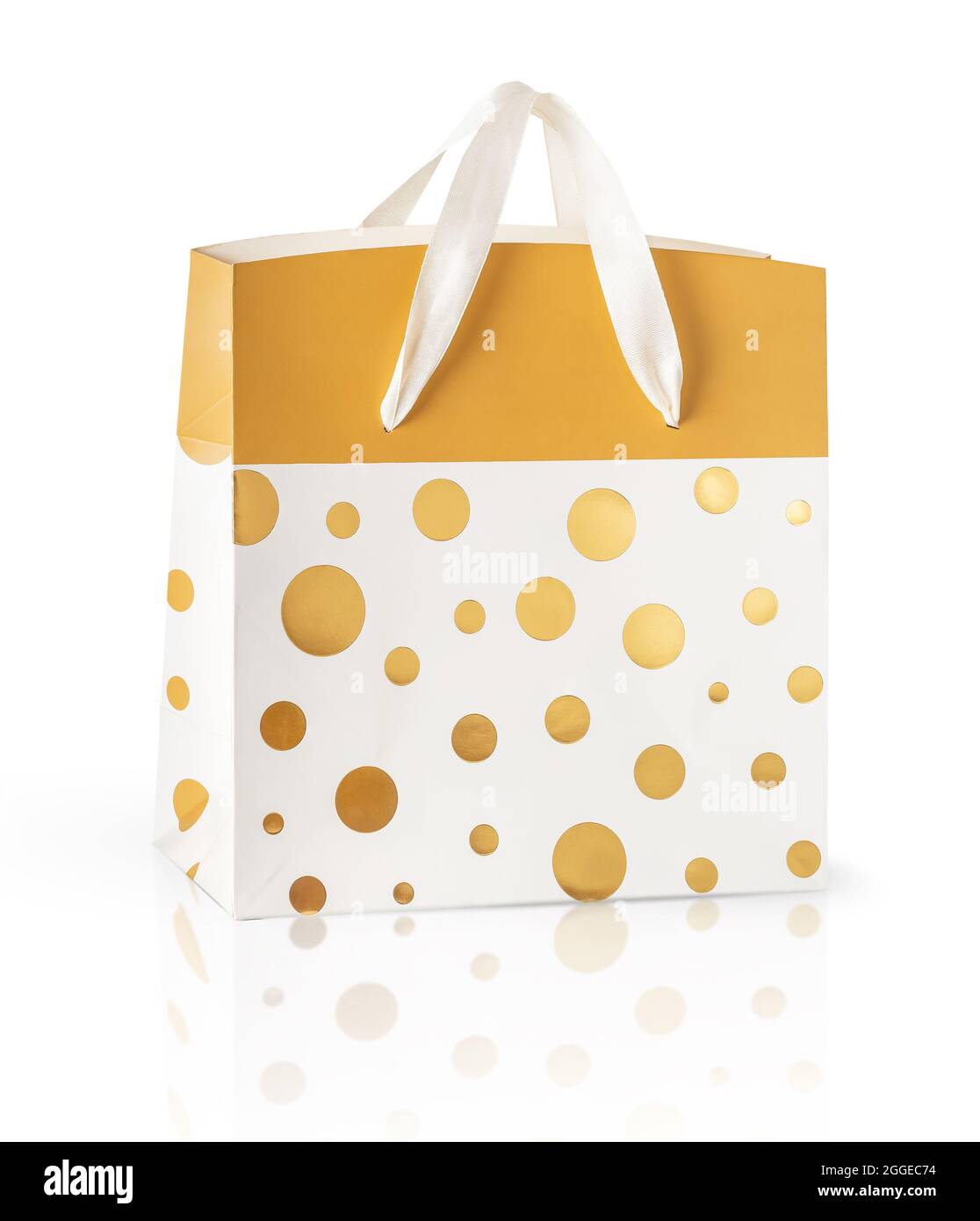Golden gift bag isolated on white background Stock Photo - Alamy
