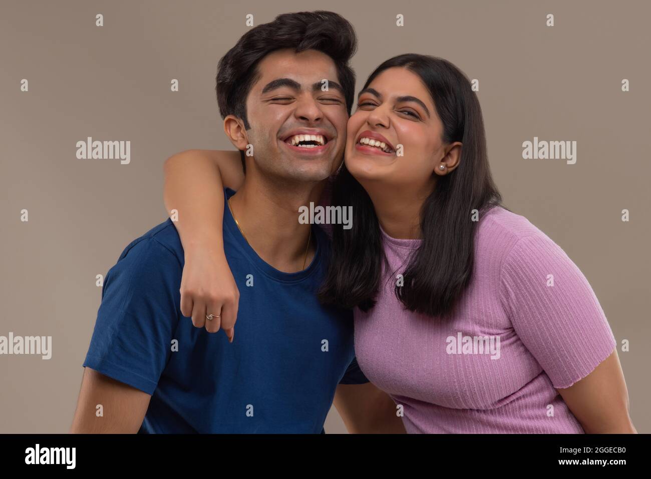 Brother sister cuddling hi-res stock photography and images - Alamy