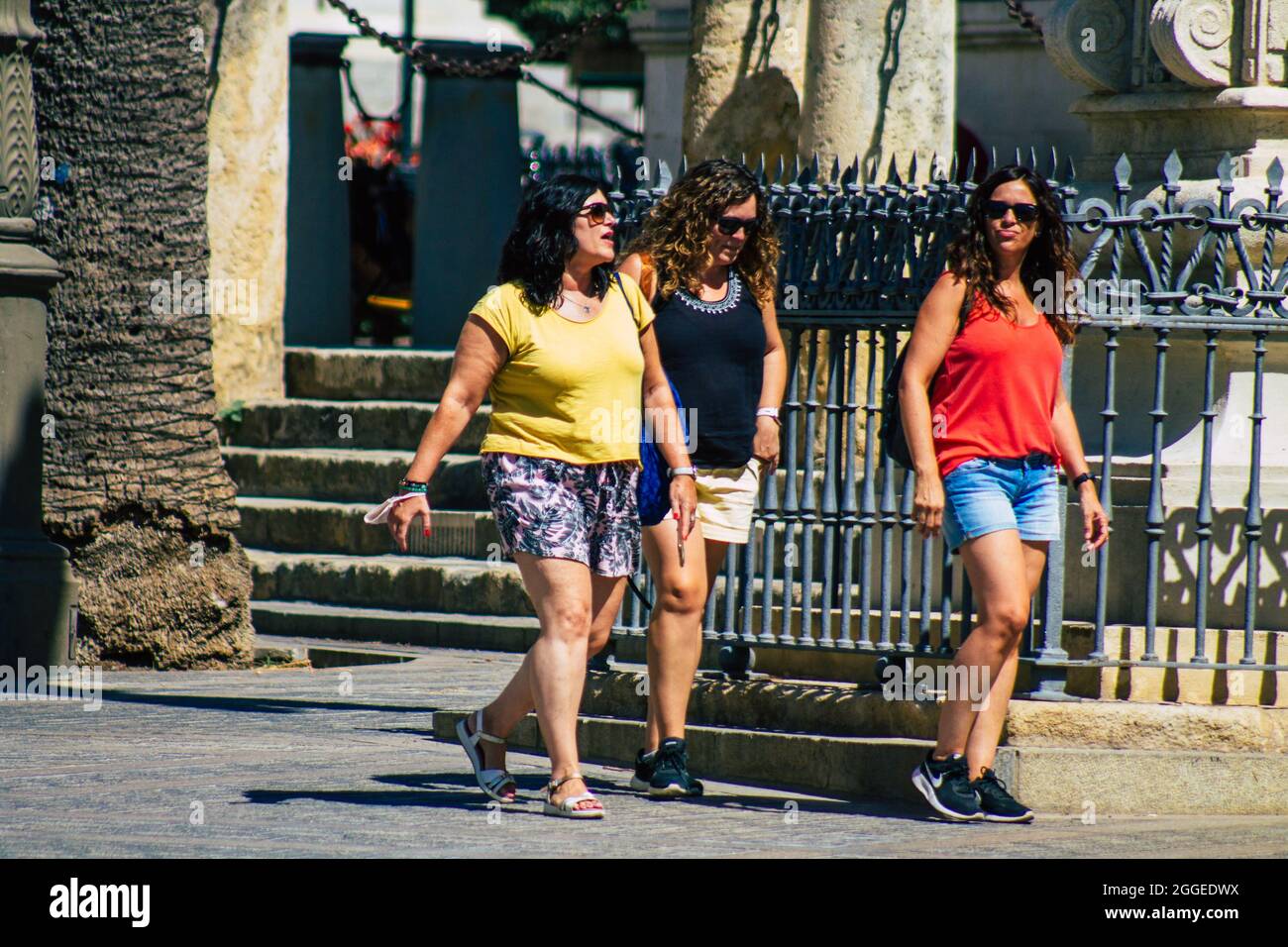 Seville Spain August 28, 2021 Pedestrian walking in the streets of ...