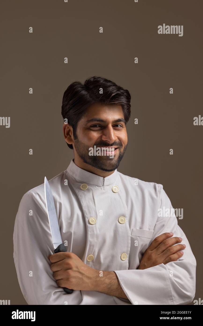 Male chef posing hands crossed hi-res stock photography and images - Alamy