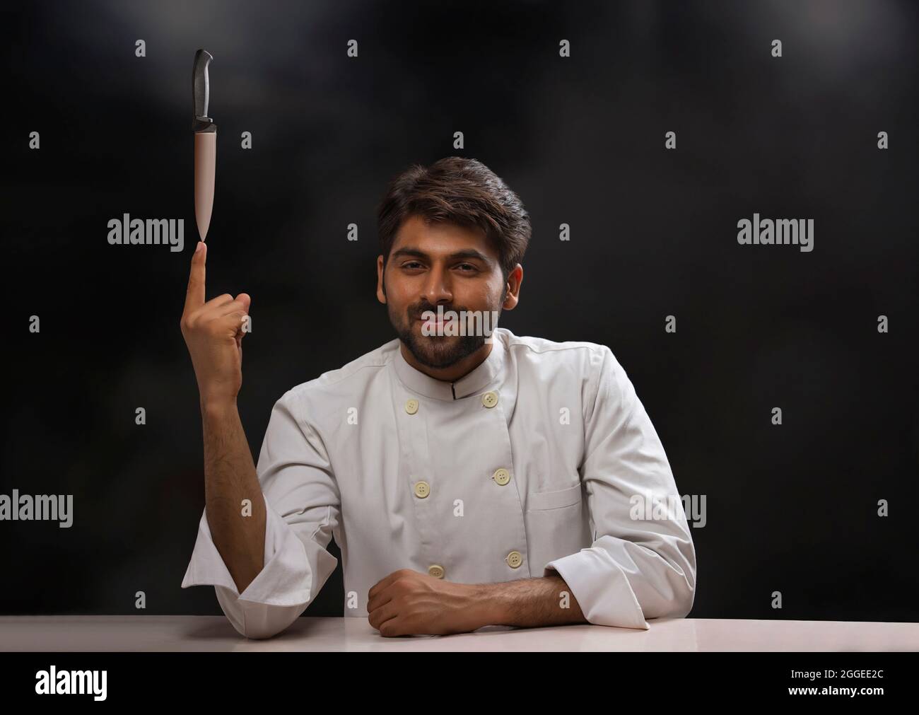 Indian man cooking, white background hi-res stock photography and ...
