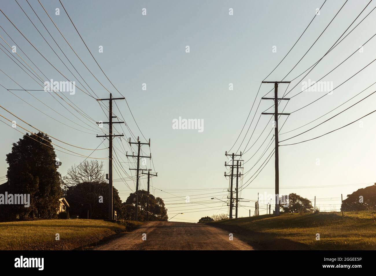 Country road high voltage pylon hi-res stock photography and images - Alamy