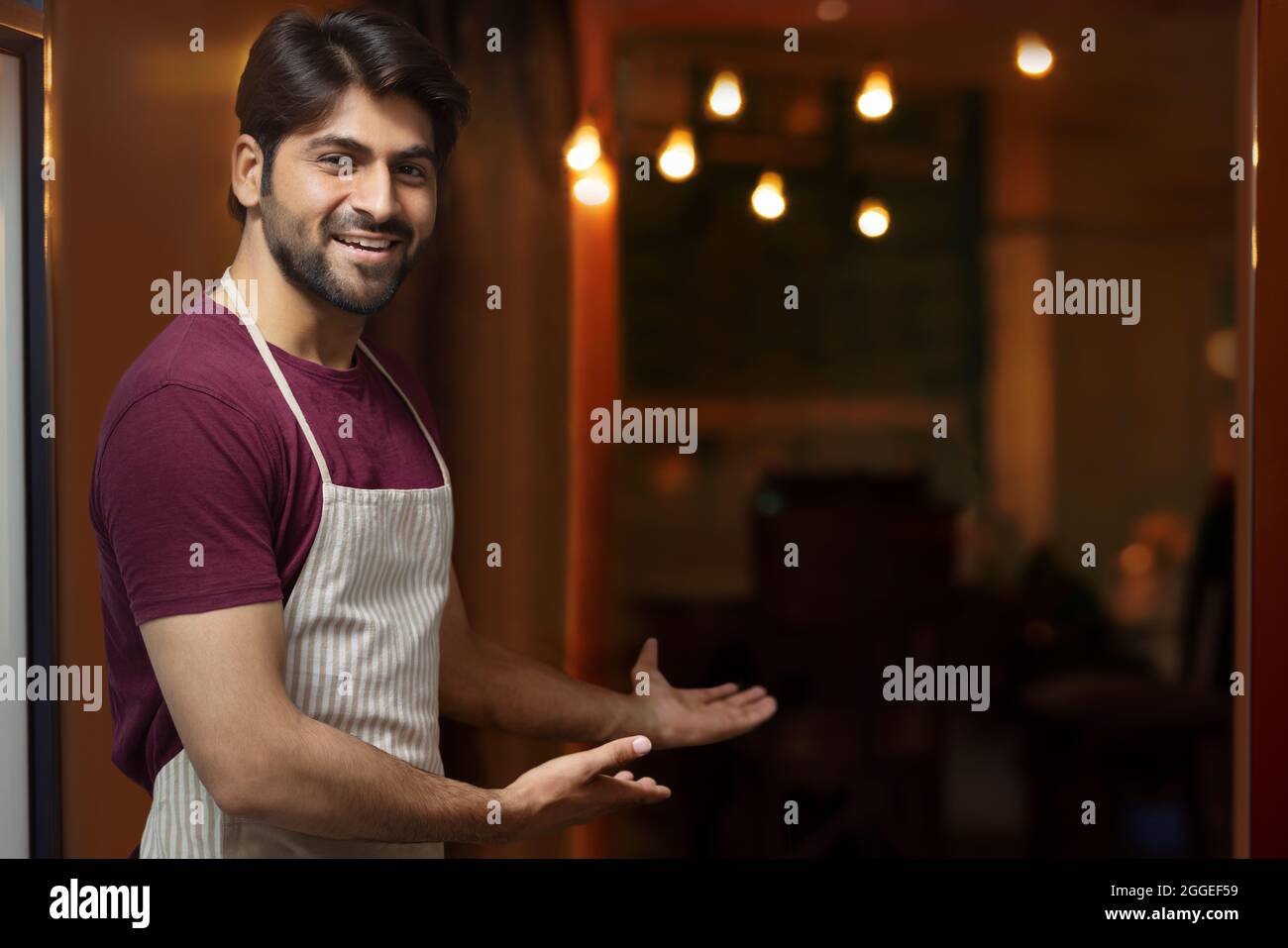 Happy waiter hi-res stock photography and images - Alamy